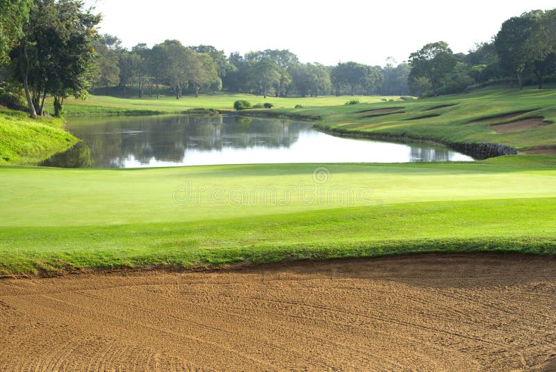 The Beauty of the Golf Course is Its Bunkers and Ponds Stock Image ...