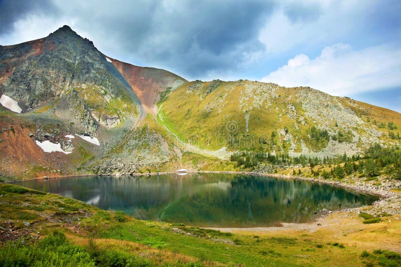 Beauty lake in mountains stock image. Image of natural - 15676749