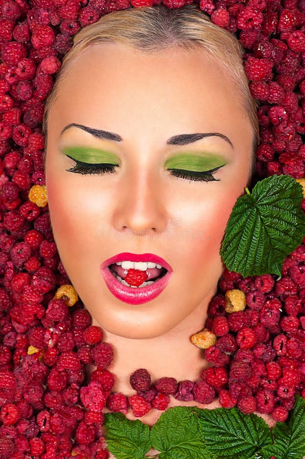 Beauty Makeup Face in Raspberries Stock Photo - Image of green, face ...