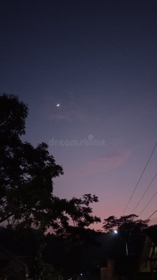 The Beauty of the Moon in the Morning with a Pink Sky Stock Image ...