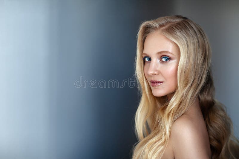 Beauty Portrait Of Nordic Natural Blonde Woman On Dark Background Stock