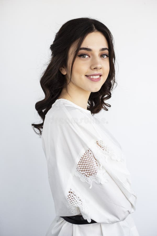 Beauty Front Portrait Of A Smiling Young Woman Wear White Shirt Posing