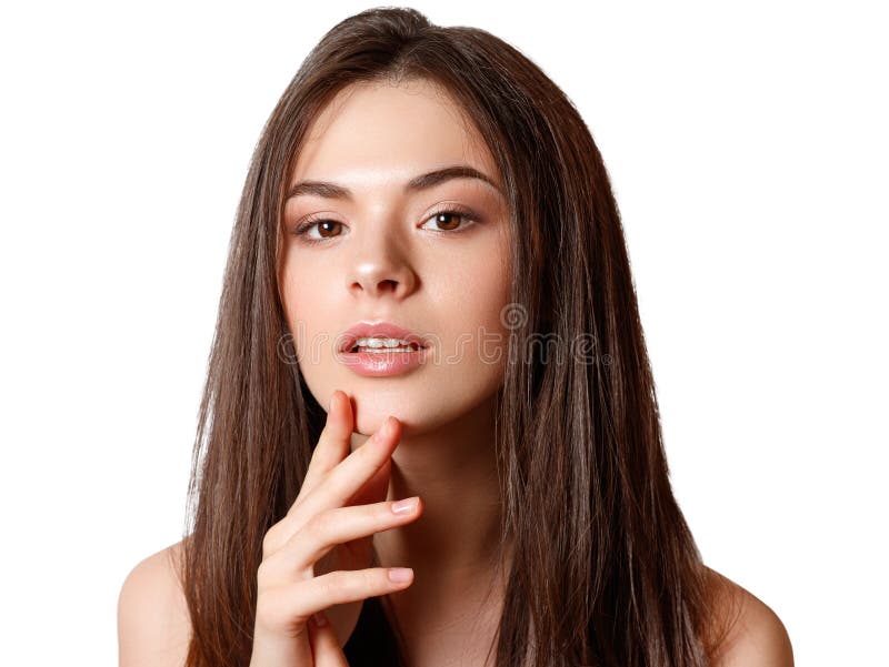 Beauty Portrait Of A Young Beautiful Brunette Girl With Brown Eyes And