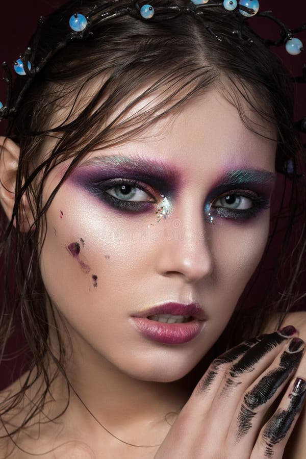 Closeup Portrait Of A Young Girl With Fashion Creative Make Up Stock