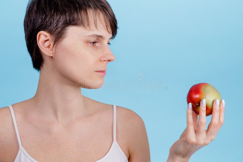 Beauty with Red Apple. Focus on Hand and Apple Stock Image - Image of ...