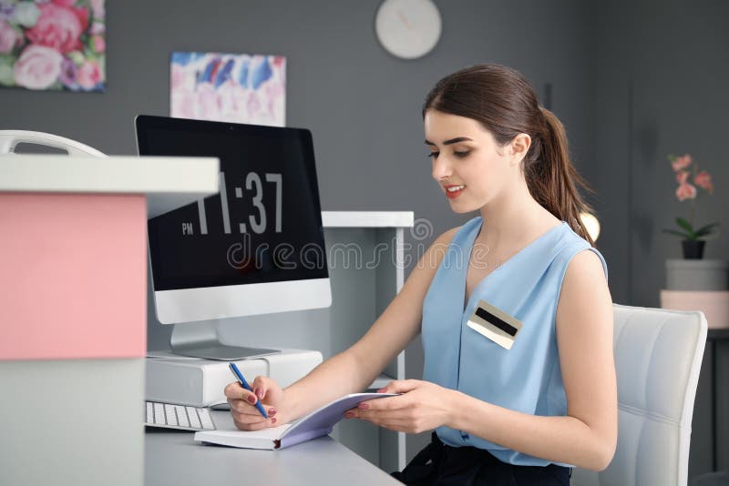 Beauty Salon Receptionist with Notebook Stock Image - Image of ...