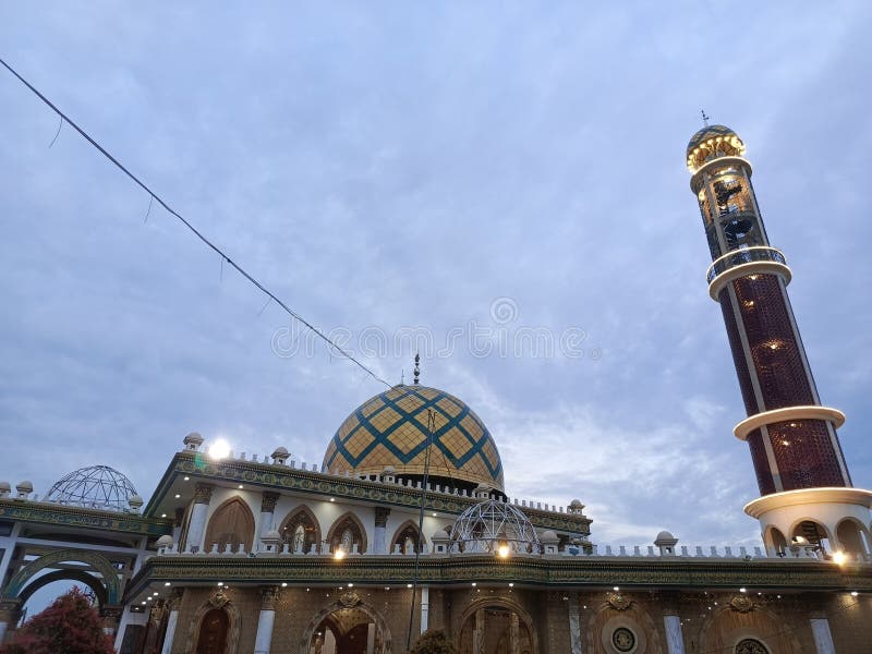 The Beauty of Sheikh Kholil Mosque Under the Clouds Stock Photo - Image ...