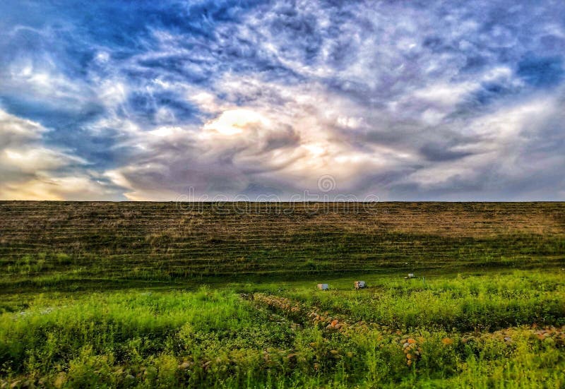 Beauty of the Sky and the Greenery. Stock Photo - Image of cloudy ...
