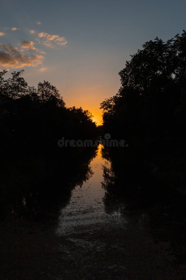Beauty Sunset Over Small River between High Trees Stock Image - Image ...