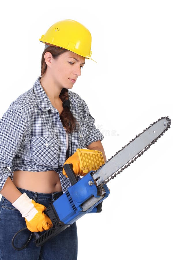 Beauty Woman With Chainsaw - Free Photo from StockFreeImages