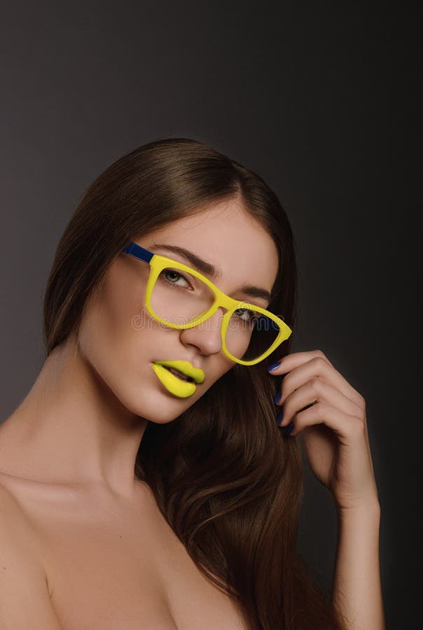 Beauty Woman Face Portrait With Yellow Lips And Yellow Glasses Stock