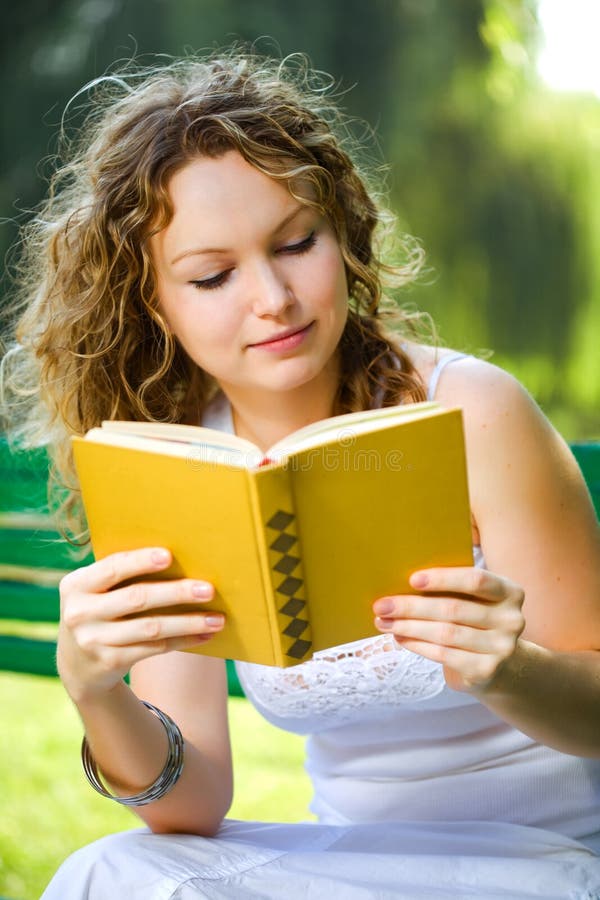 Beauty Woman Reading a Book Stock Photo - Image of beautiful, friendly ...