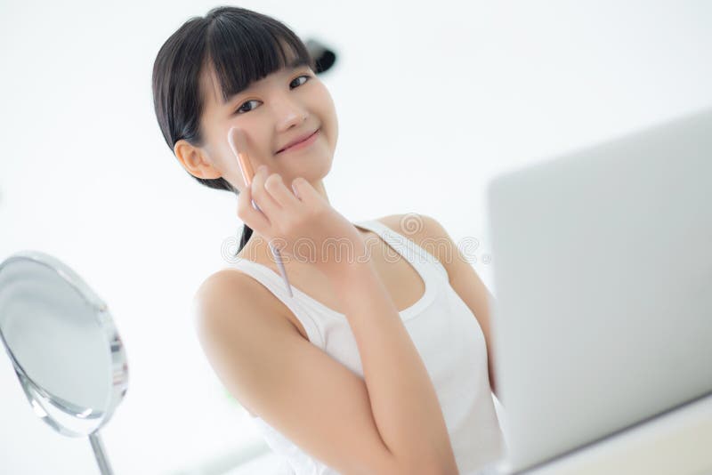 Beauty of Young Asian Woman with Learning Makeup with Brush on Cheek on ...