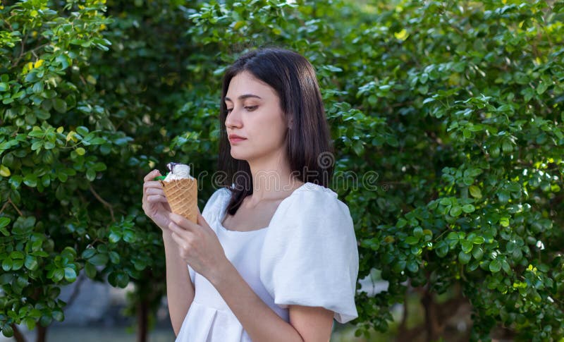 Beauty Young Woman Eating An Ice Cream Cheerful Young Women Eating