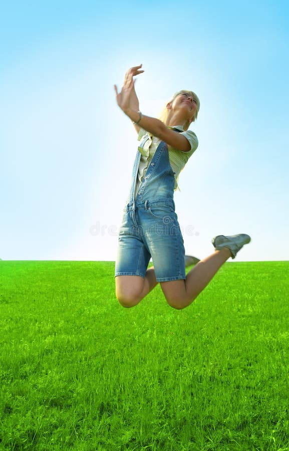 Beauty Young Woman Jump in Field Stock Image - Image of blue, floral ...