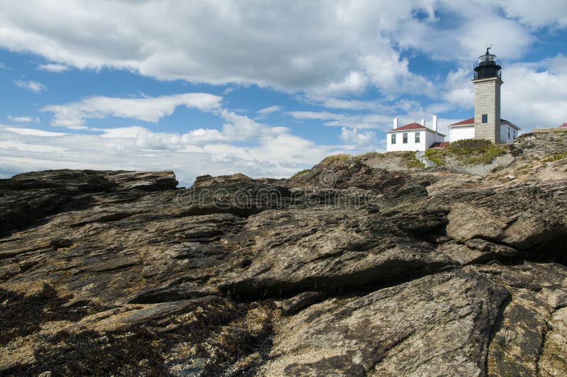 Beavertail Lighthouse Over Unique Rock Formations Stock Image - Image ...