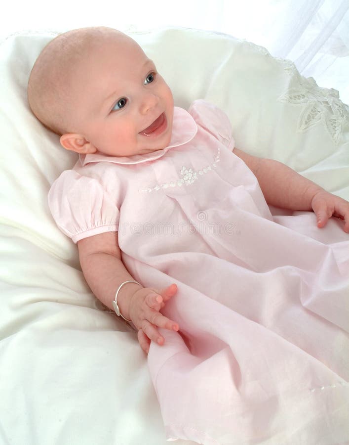 Bebé en color de rosa foto de archivo. Imagen de bordado - 4511468