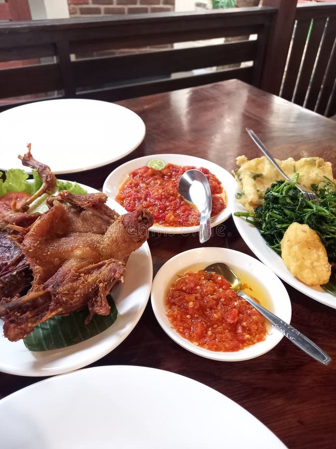 Bebek Goreng - Fried Duck with Sambal and Fried Vegetables Stock Image ...