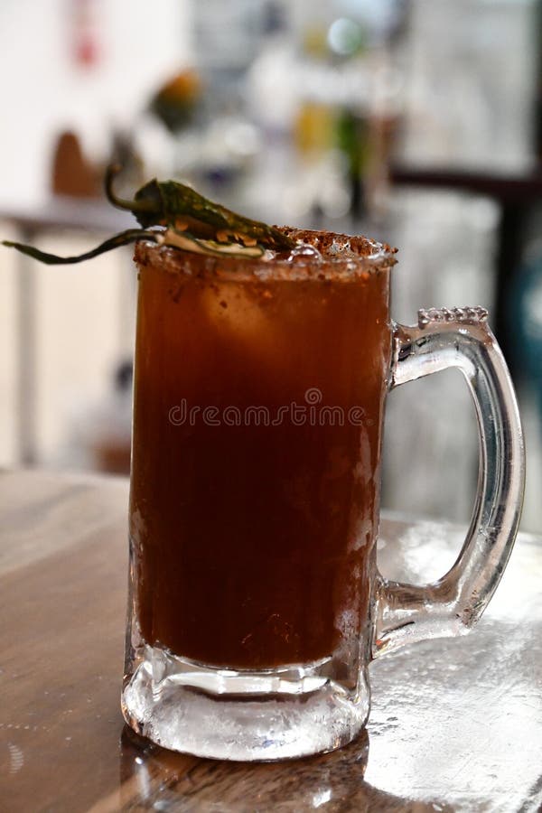 Cerveza Michelada En Mesa De Madera. Cuatro Cervezas. Bebida Mexicana ...