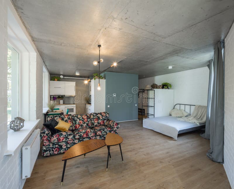 Bed in the Apartment. Bedroom in Studio Apartment. Stock Image - Image ...