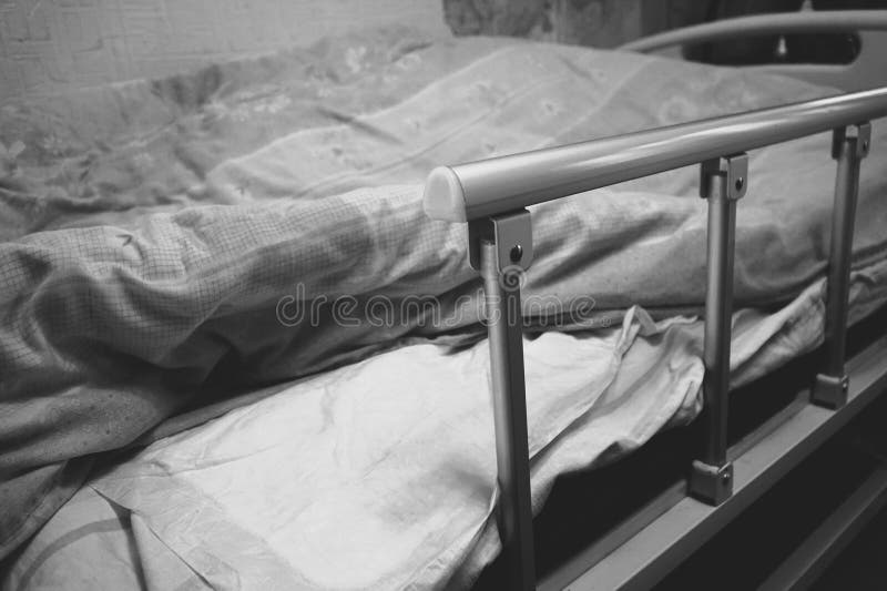 Bed for a Bedridden or Disabled Person in a Room Stock Image - Image of ...