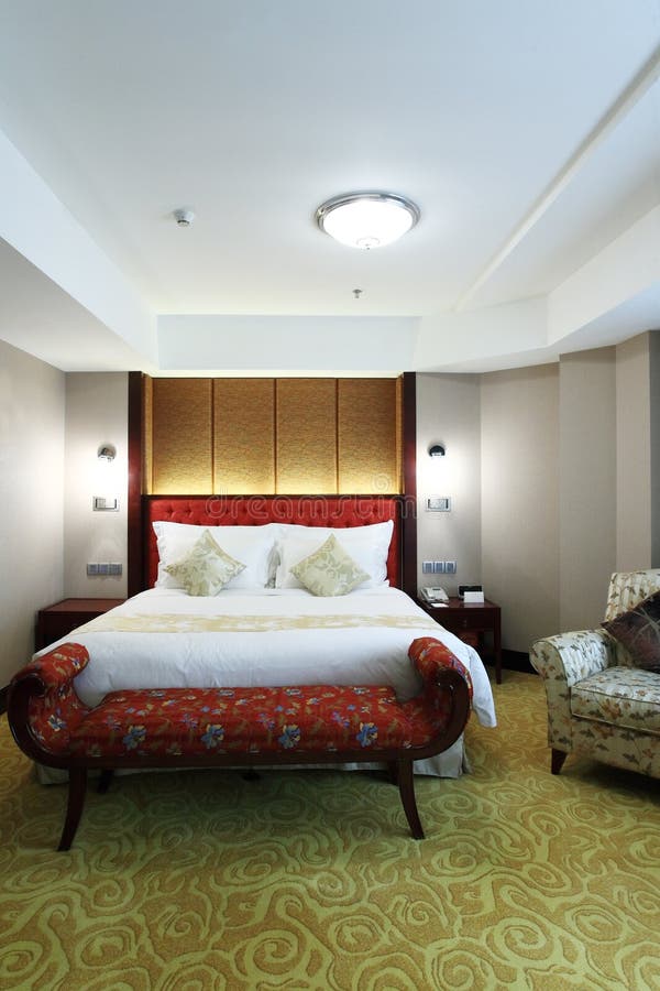 Bed in living room stock image. Image of interior, home - 7692271