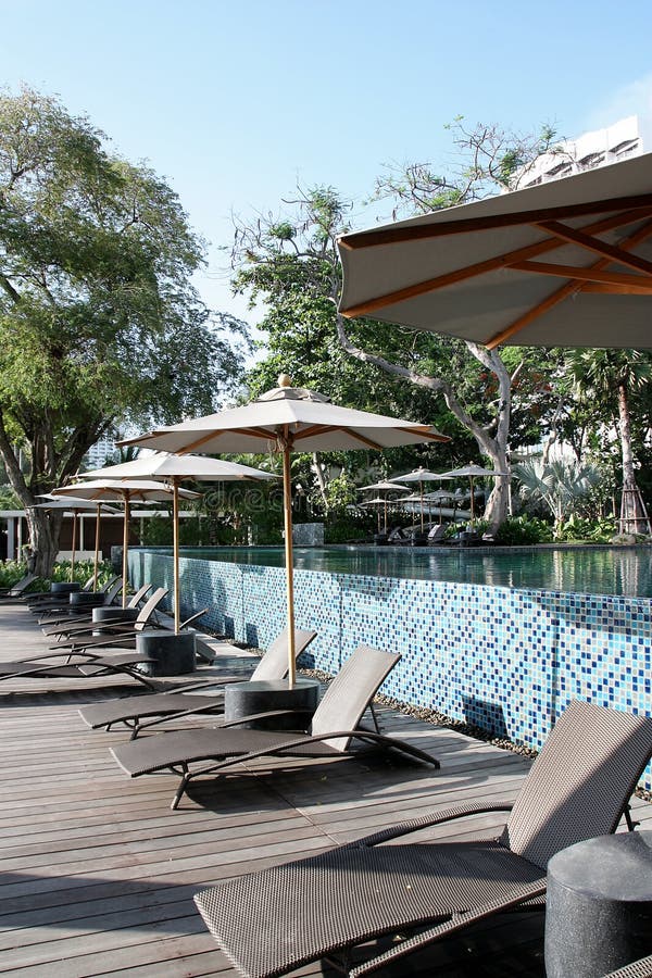 Bed beside the pool. stock photo. Image of swim, bathing - 20332570