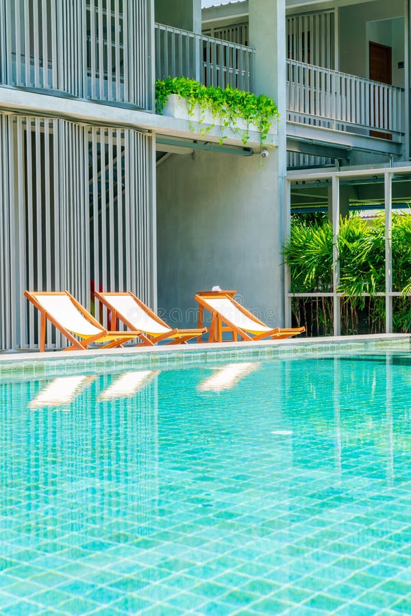 Bed Pool Around Swimming Pool in Hotel Resort Stock Image - Image of ...