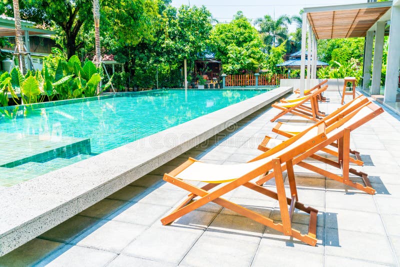 Bed Pool Around Swimming Pool Stock Image - Image of modern, swimming ...