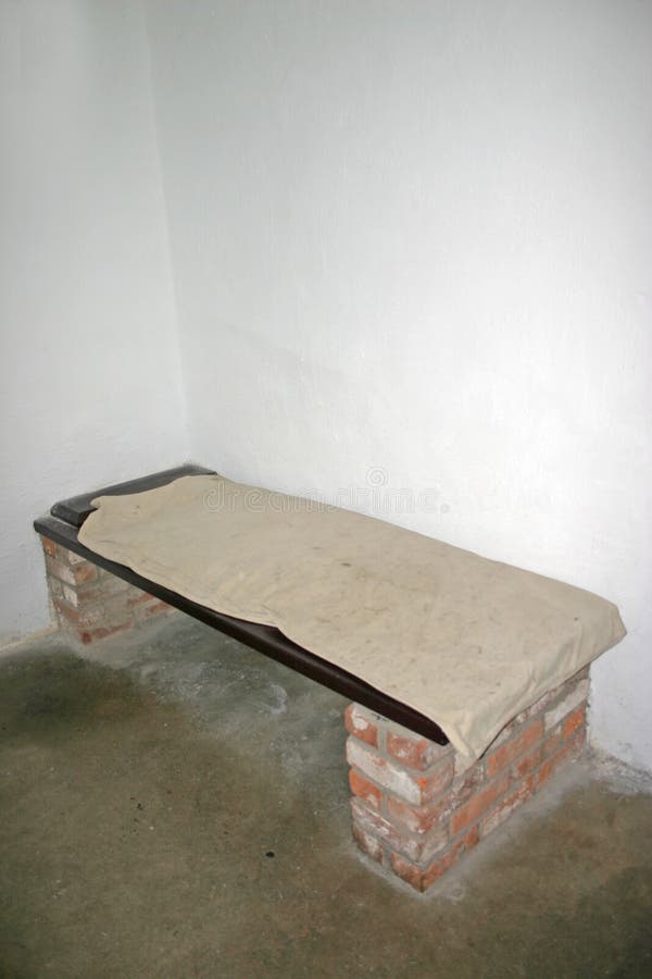 Bed in prison cell stock photo. Image of historic, small - 932938