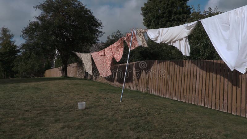 Bed Sheets Drying Outside in the Wind Stock Footage - Video of ...
