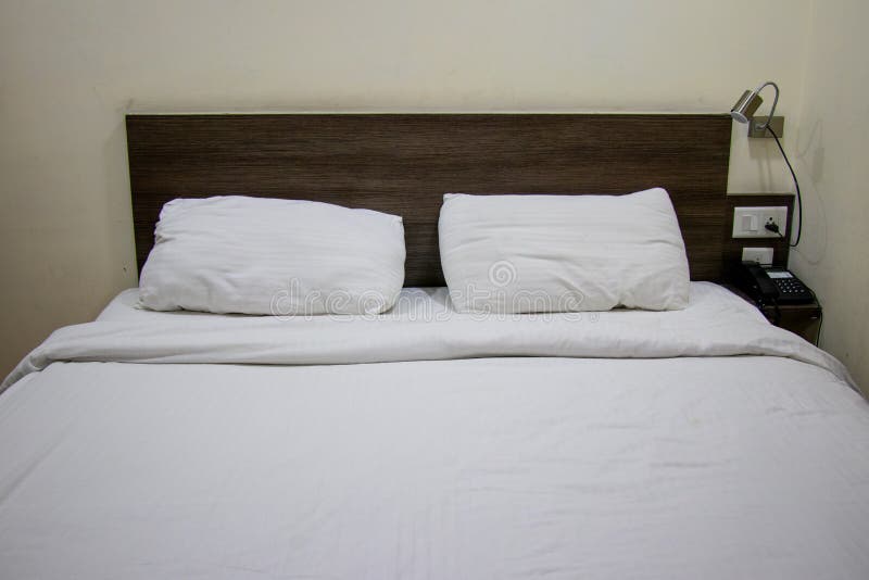 Bed with White Sheets and Pillows Stock Image - Image of decor, light ...