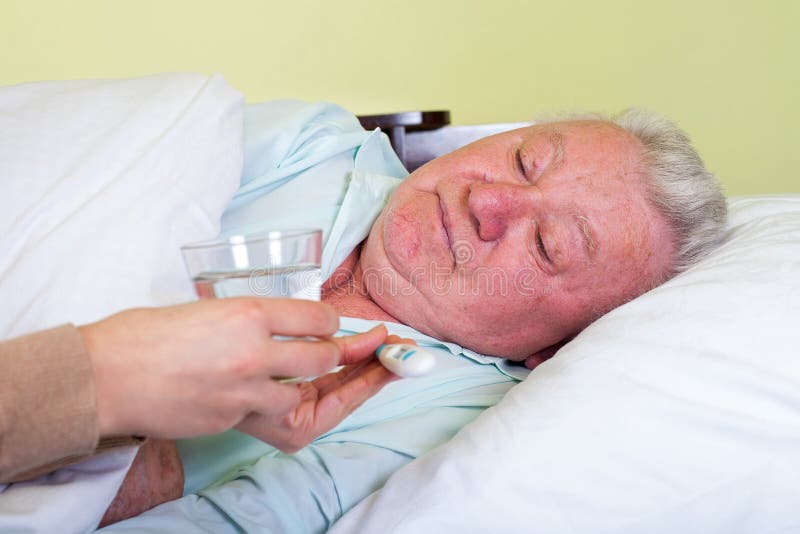 Bedridden Elderly Man Having High Temperature Stock Image - Image of ...