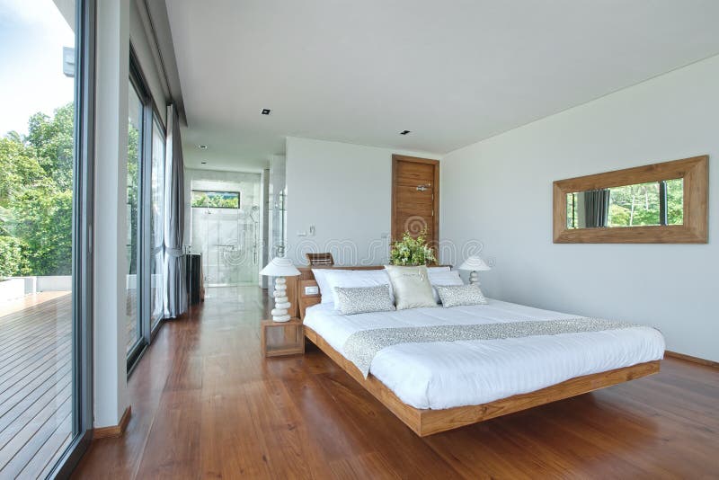 Parquet floor in bedroom stock image. Image of lamp, furnishings - 10397279