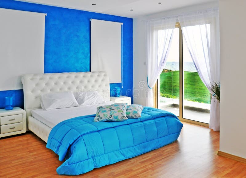 Bedroom in Blue with Sea View Stock Photo - Image of relax, colour ...