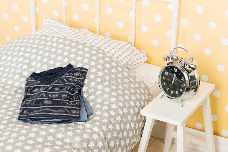 Bedroom with Pyjama S for Man Stock Photo - Image of furniture, folded ...