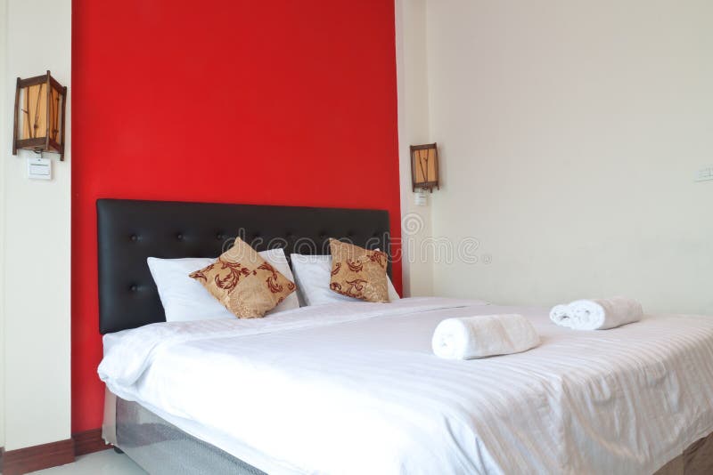 Bedroom with Red Flower Wallpaper Stock Photo - Image of home, decor ...