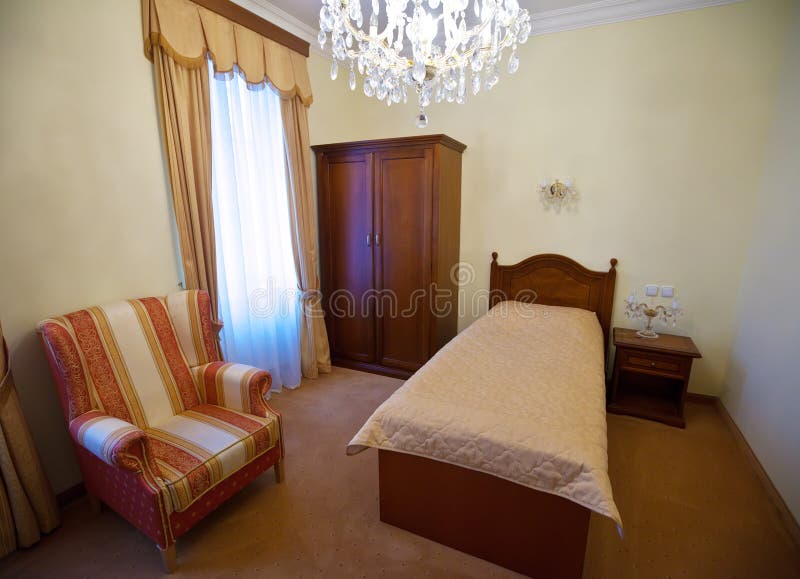 Bedroom with single bed stock image. Image of cover, apartment - 24486967