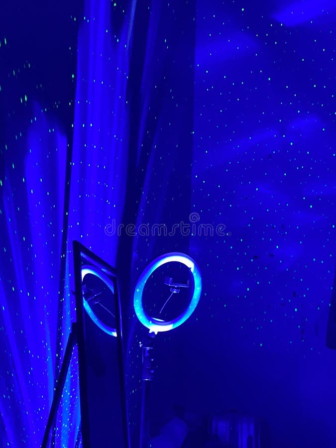 The Bedroom Walls are Decorated with Blue Bedroom Lamps Stock Photo ...