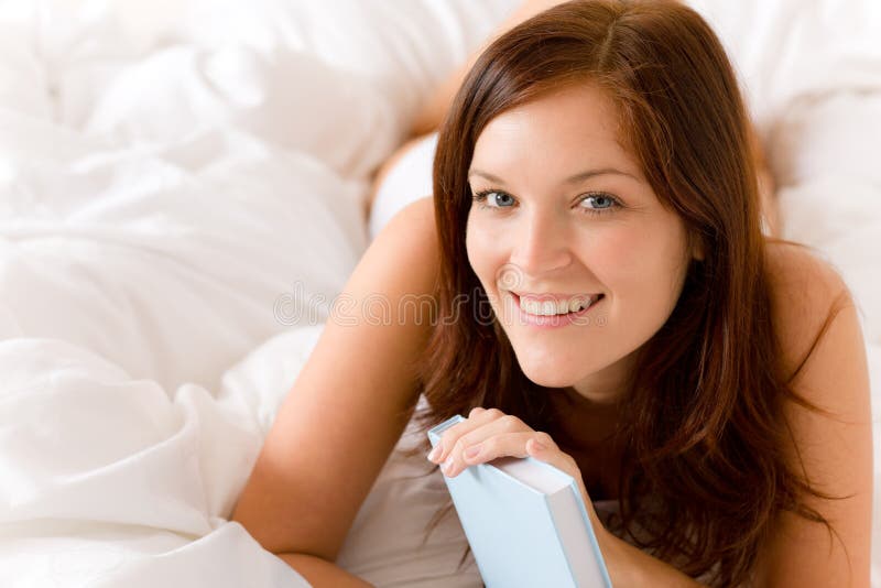 Bedroom - Young Happy Woman with Book Stock Photo - Image of blanket ...