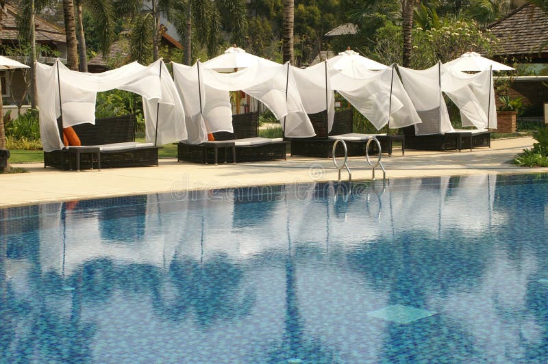 Private tent beside pool stock image. Image of water, framework - 3008343