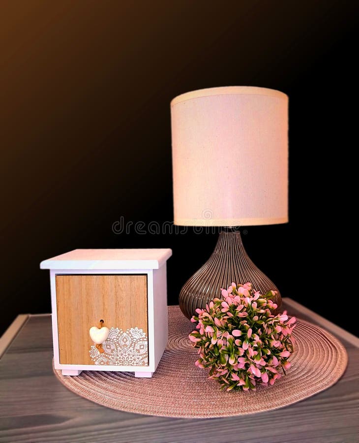 Nice bedside table decor stock photo. Image of lamp - 140109266