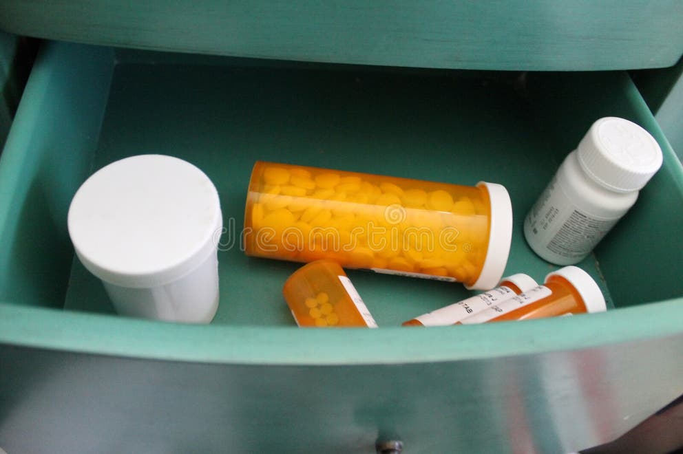 Bedside Table with Open Drawer of Medications Stock Photo - Image of ...