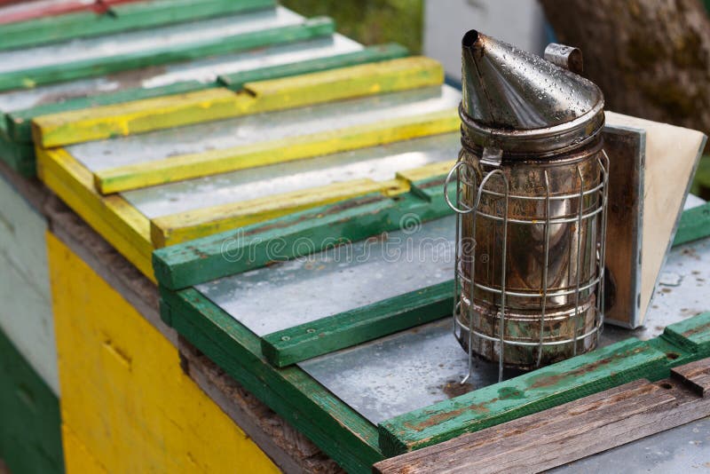 Bee Smoker on Top of Beehives Boxes Stock Image - Image of light ...
