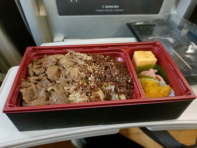 Beef bento on a train stock photo. Image of lunch, meal - 352551384