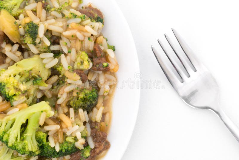 Beef Broccoli and Rice Dinner on a Plate with Fork Stock Photo - Image ...