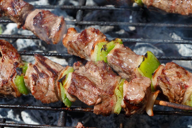 Beef brochette on barbecue stock photo. Image of meat - 126650952
