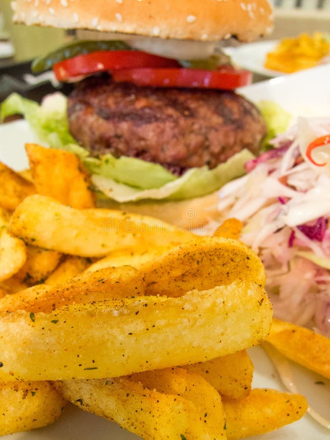 Beef Burger with French Fries and Sliced Raw Cabbage Stock Image ...