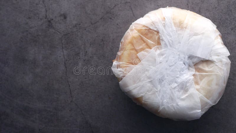 Beef Burger in a Paper Packet on Table Stock Footage - Video of burger ...