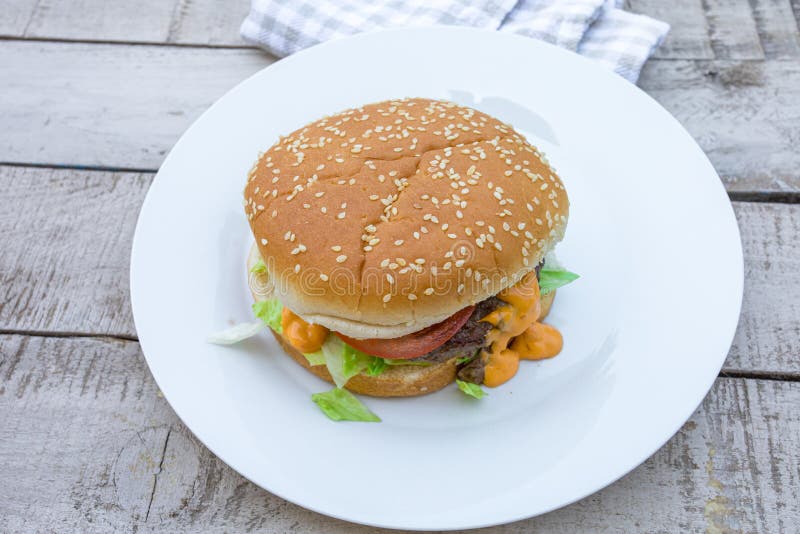 Beef burger on a plate stock image. Image of meat, plate - 161289043